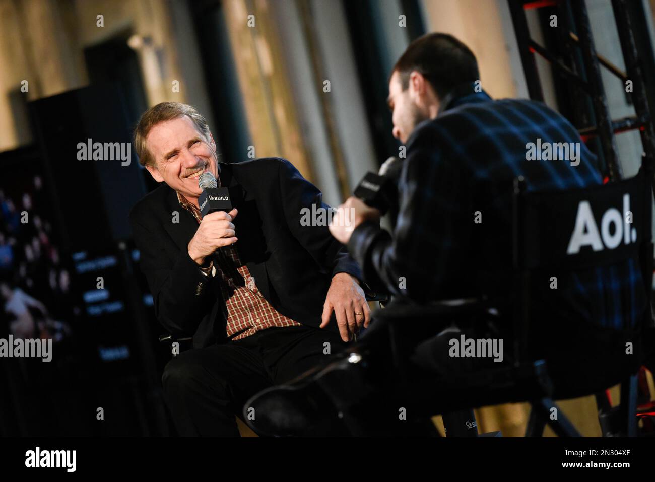 Moderator Peter Travers, left, chats with actor Zachary Quinto during ...