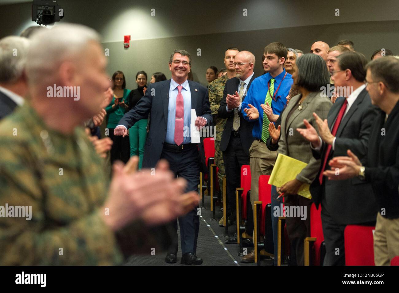 Defense Secretary Ash Carter smiles as he enters the Pentagon ...