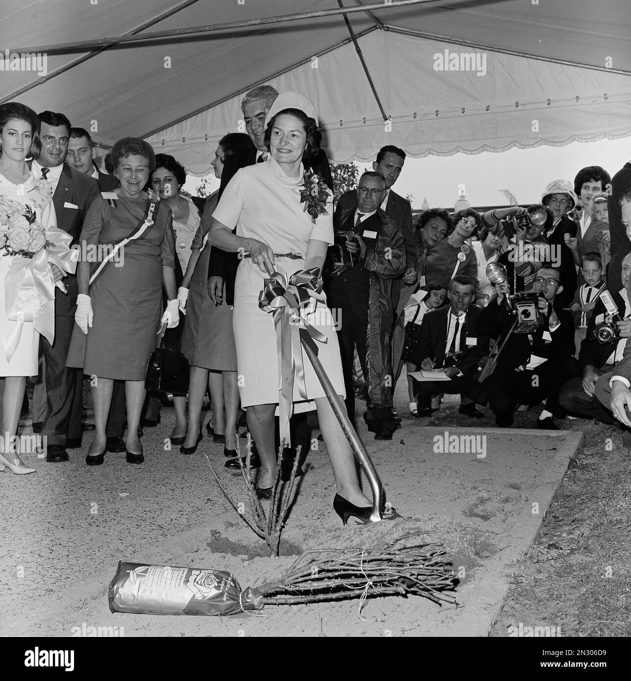 Lady Bird Johnson, wife of President Lyndon Johnson, takes part in a ...