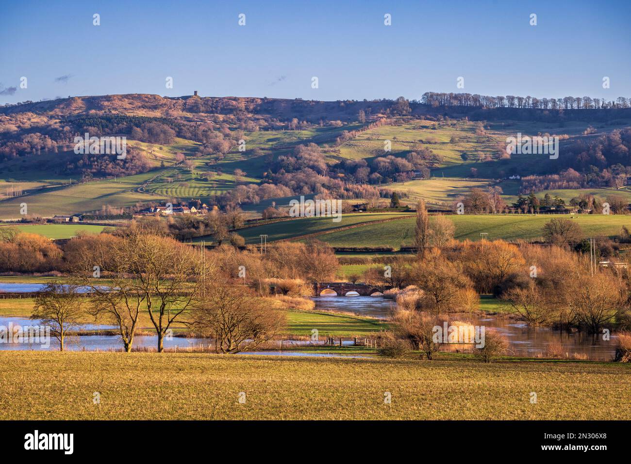 Bredon Hill Tower and Eckington Bridge over the River Avon in the ...