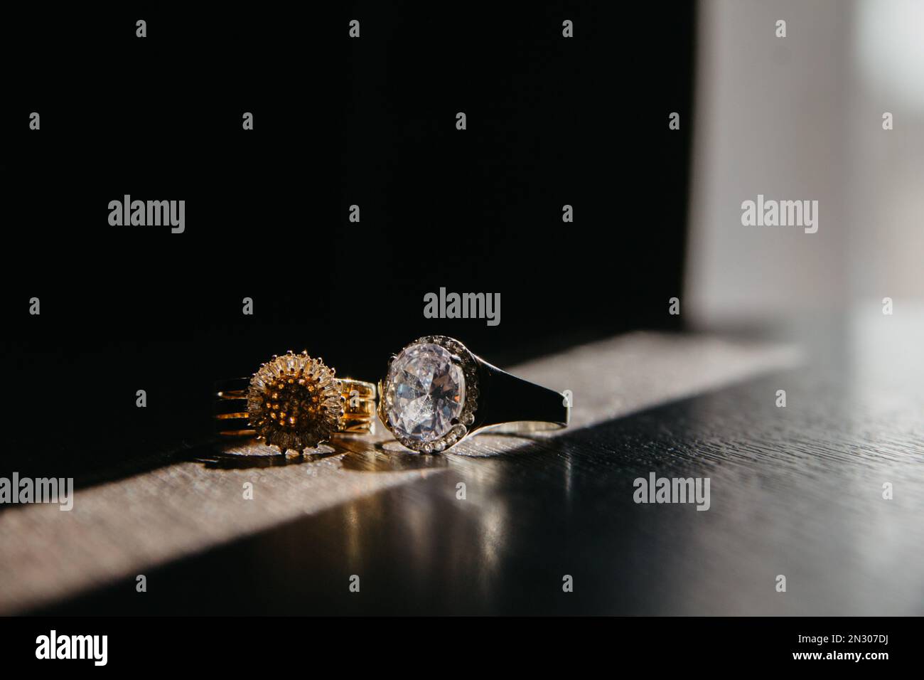 Wedding Rings in shadow Stock Photo - Alamy