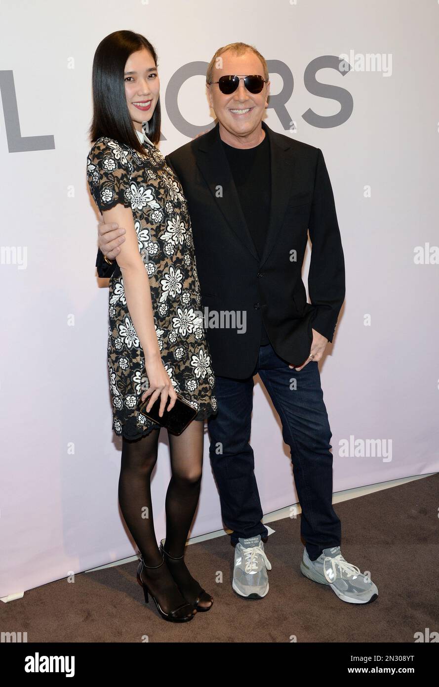 Model Tao Okamoto and designer Michael Kors attend the Miranda Eyewear ...
