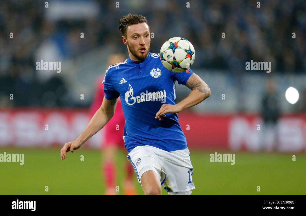 Schalke's Marco Hoeger eyes a ball during the Champions League round of ...
