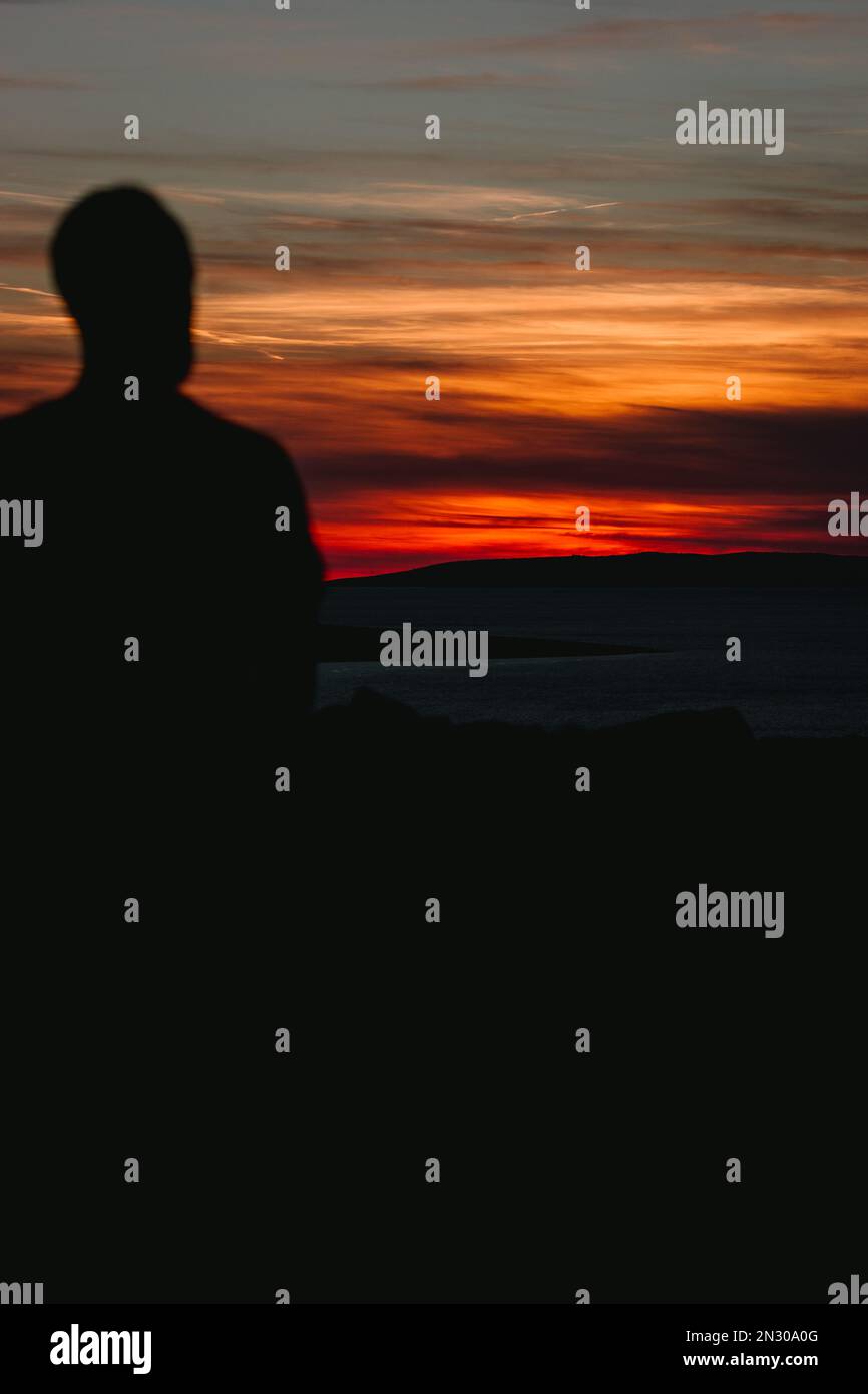 Contemplating sunset hi-res stock photography and images - Alamy