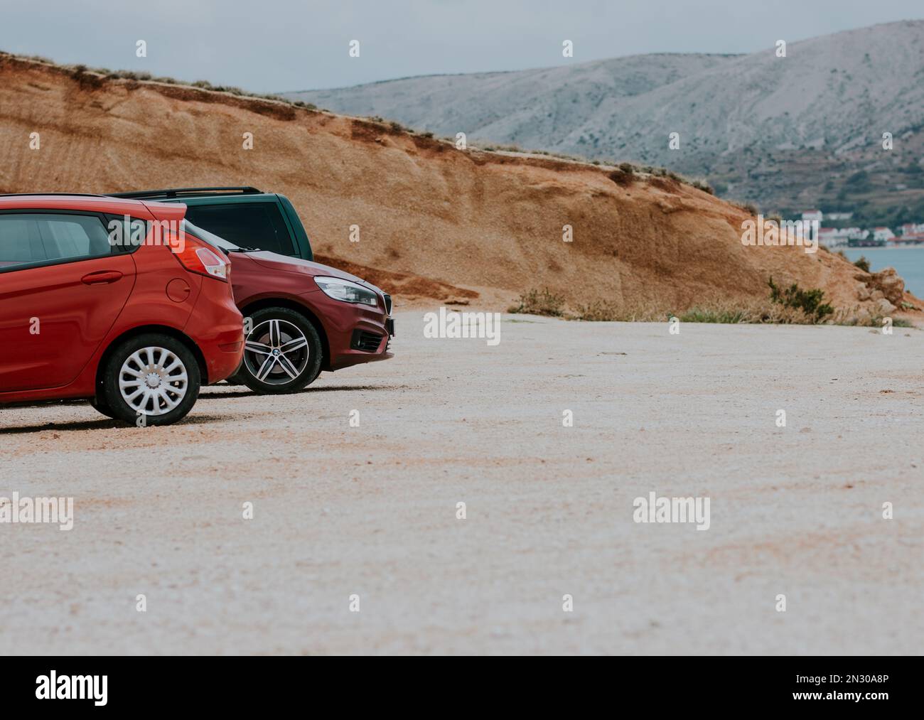 Three cars on the coastline Stock Photo - Alamy