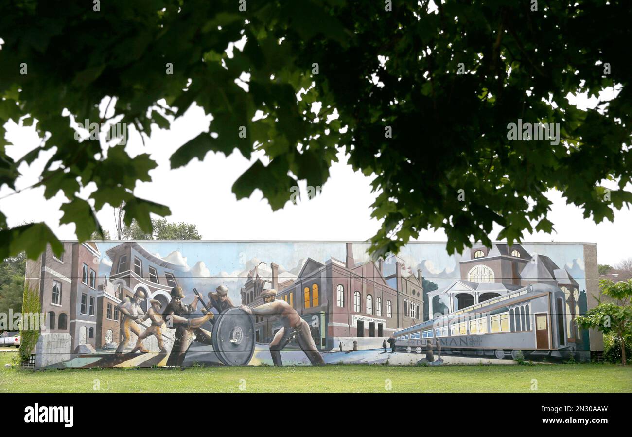 FILE - In this Aug. 22, 2014 file photo, a mural in in the Pullman ...