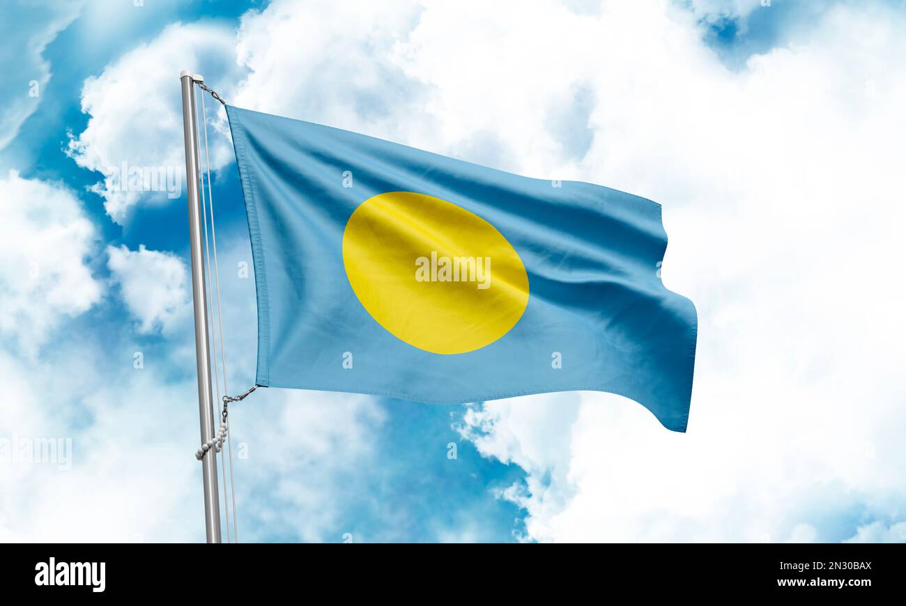 Palau flag waving on sky background. 3D Rendering Stock Photo - Alamy