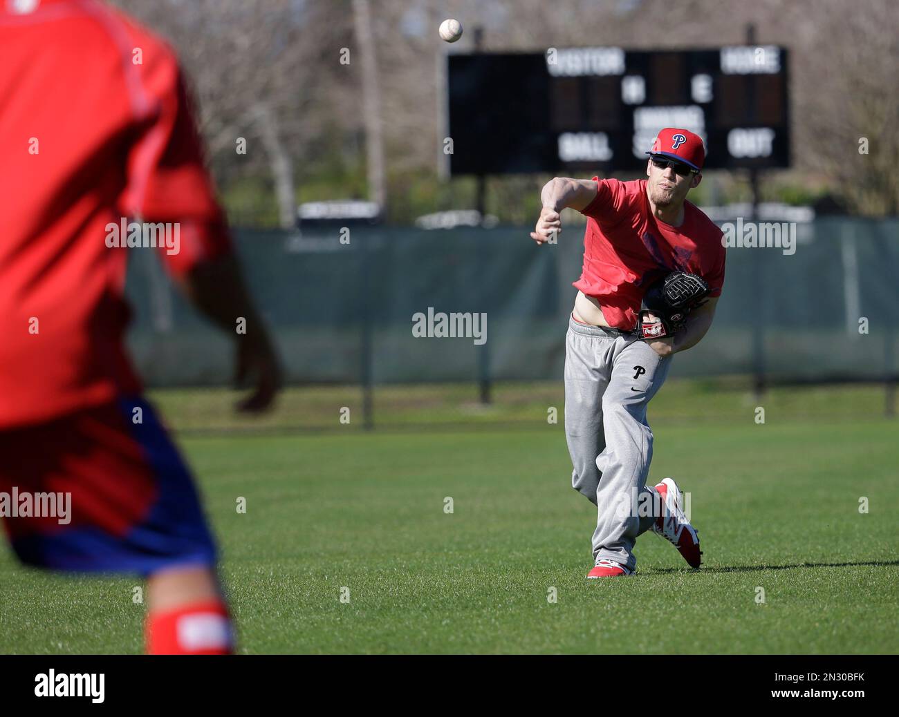 Philadelphia Phillies relief pitcher Ken Giles, right, throws during a ...