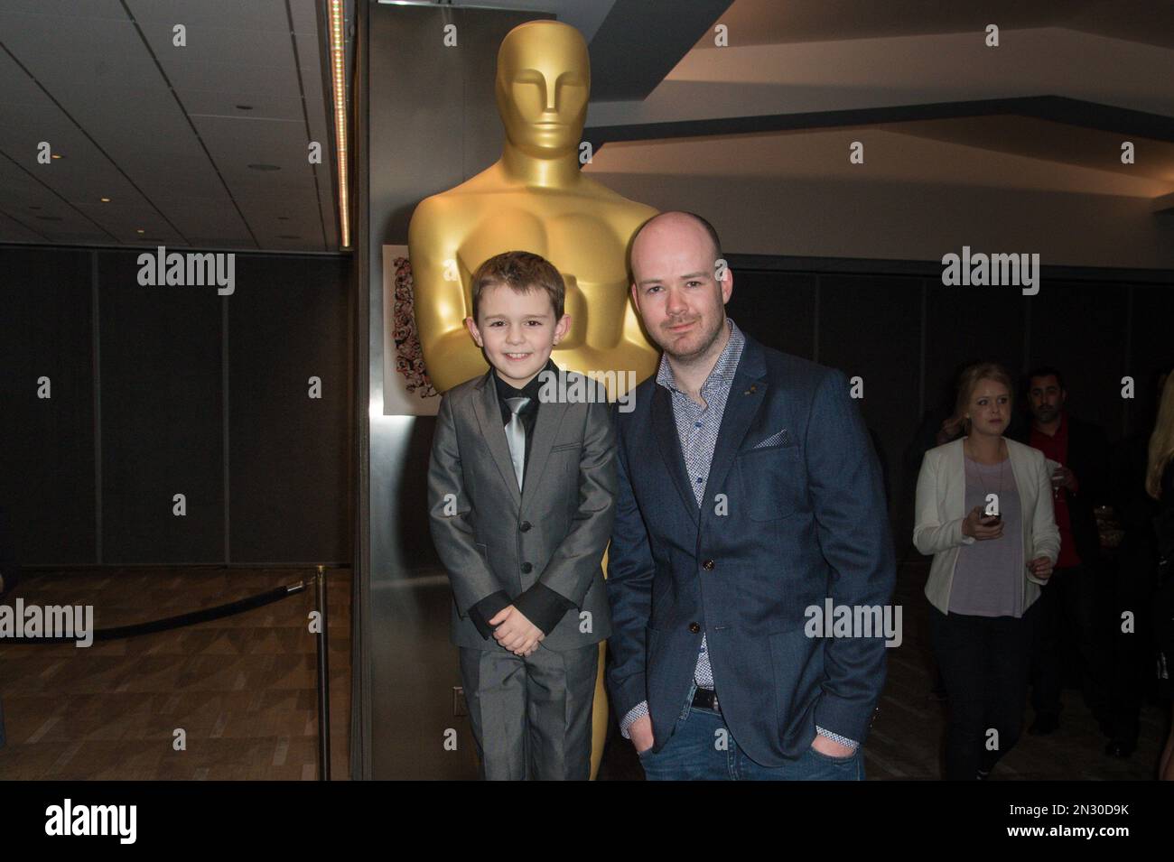 Riley Hamilton, left, and Michael Lennox arrive at the 87th Academy ...