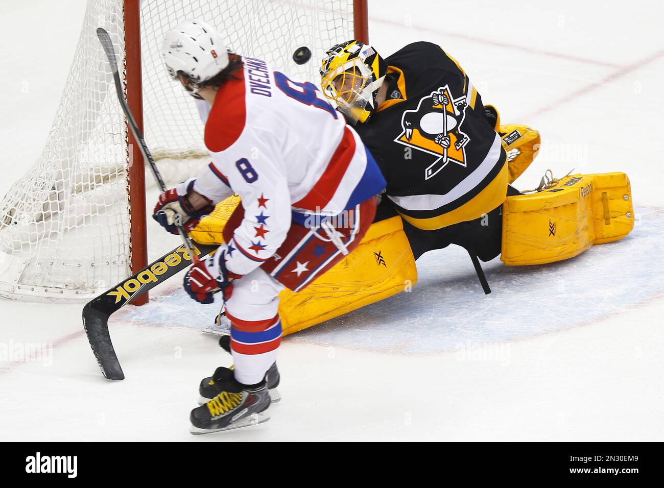 Washington Capitals' Alex Ovechkin (8) lifts the puck over Pittsburgh ...