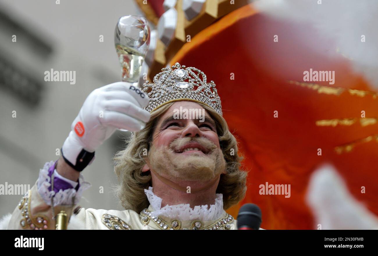 Rex, King of Carnival, Christian T. Brown, toasts the crowd during the ...