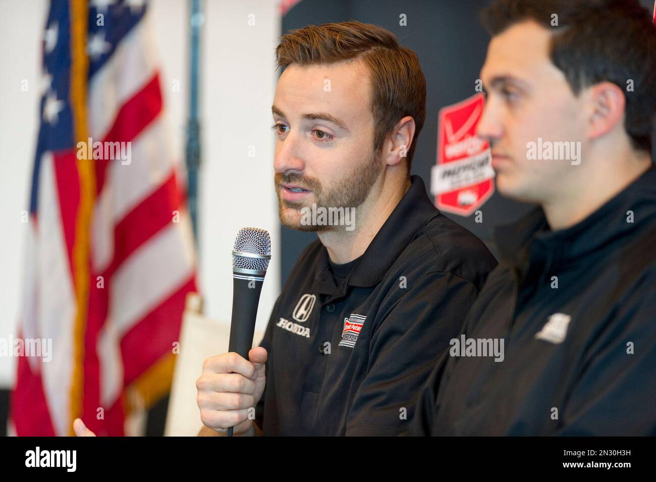 IndyCar driver James Hinchcliffe of Canada talks with reporters during ...