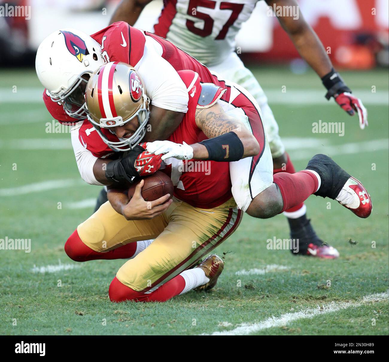 Arizona Calif.rdinals outside linebacker Sam Acho #94 and San Francisco ...