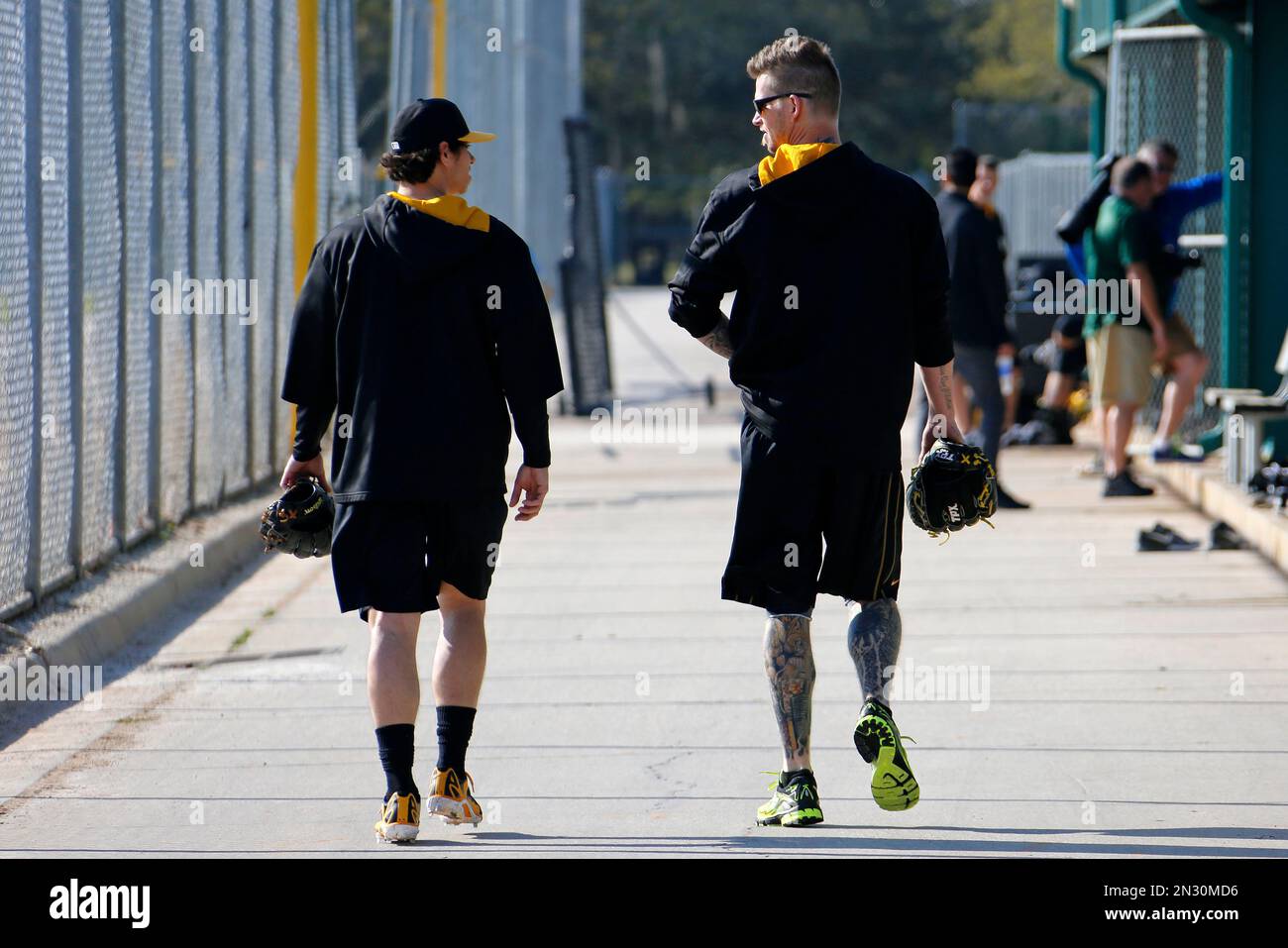 Pittsburgh Pirates pitchers A.J. Burnett, right, and Jeff Locke, arrive ...