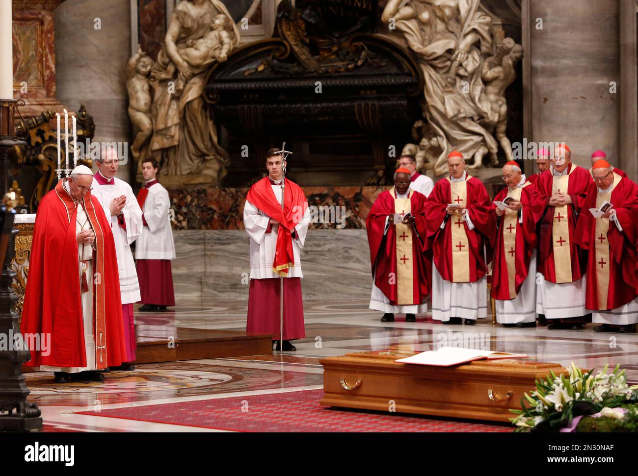 Pope Francis prays at the end of Cardinal Karl Josef Becker's funeral ...