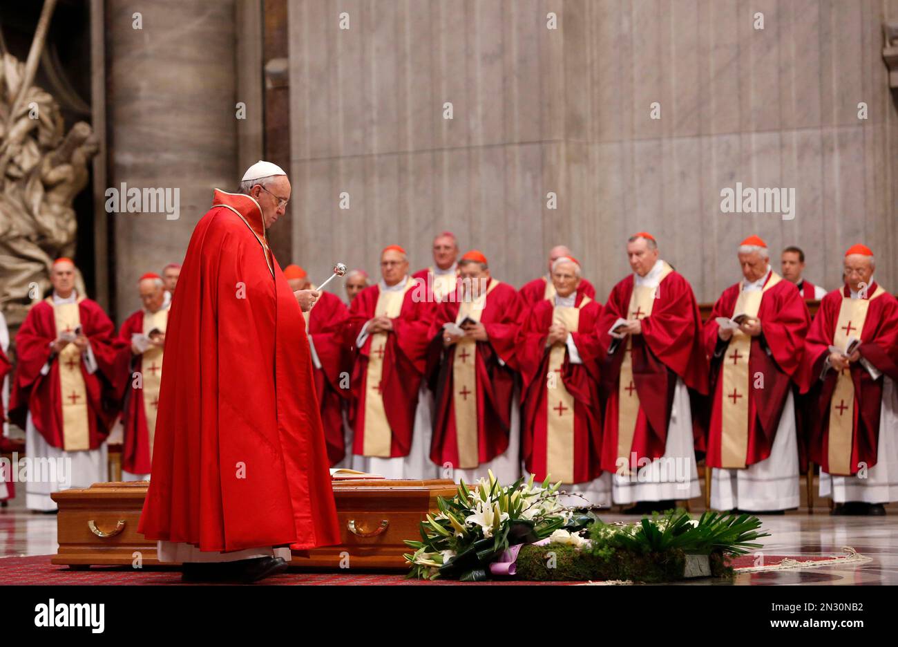 Pope Francis blesses the coffin of Cardinal Karl Josef Becker at the ...