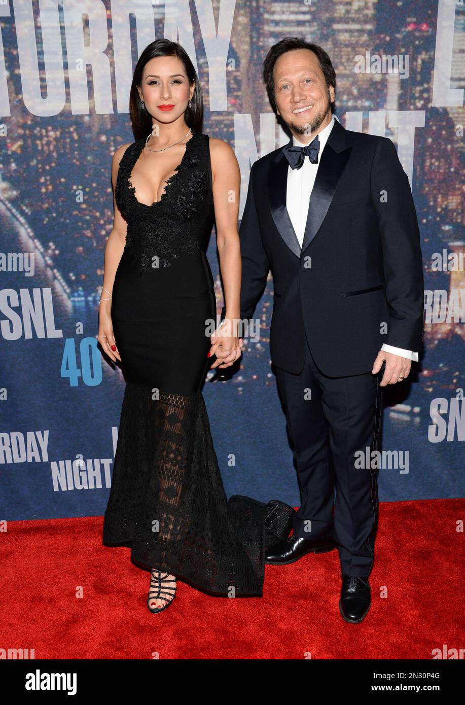 Rob Schneider and wife Patricia Azarcoya Arce attend the SNL 40th Anniversary Special at ...
