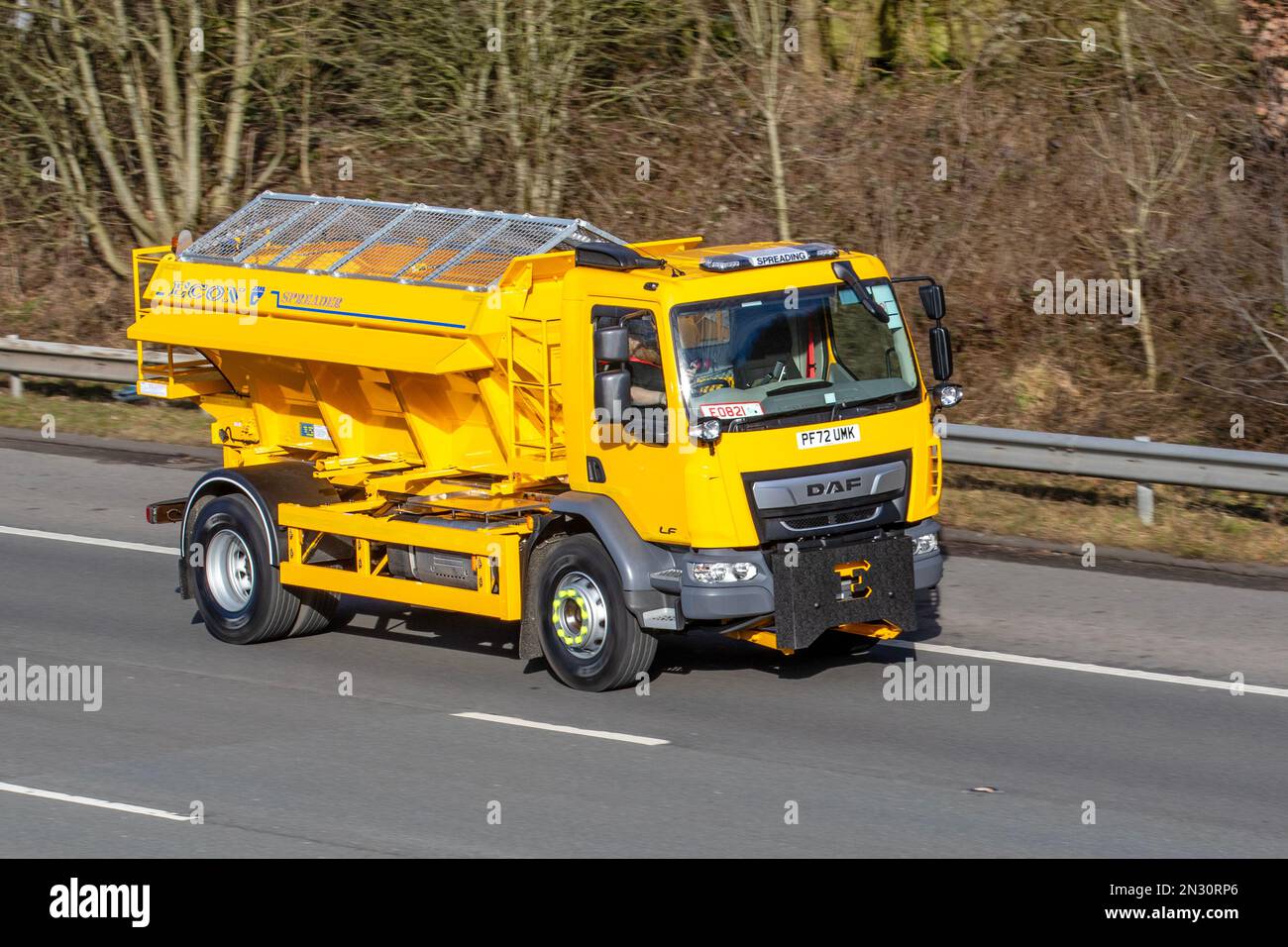 NEW ECON SPREADER 2022 DAF LF travelling on the M61 motorway UK Stock ...