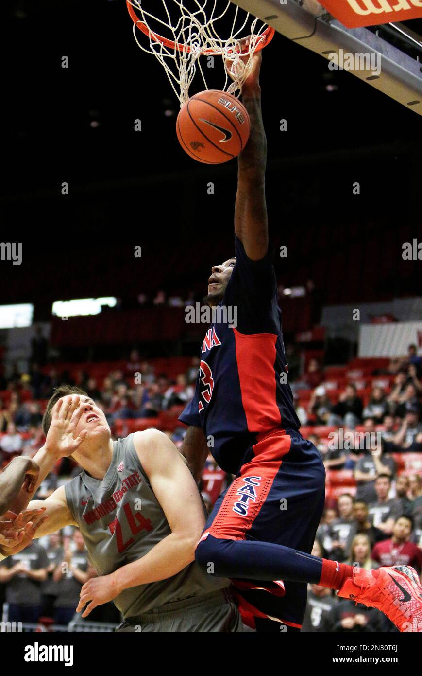 Arizona's Rondae Hollis-Jefferson, right, dunks against Washington ...