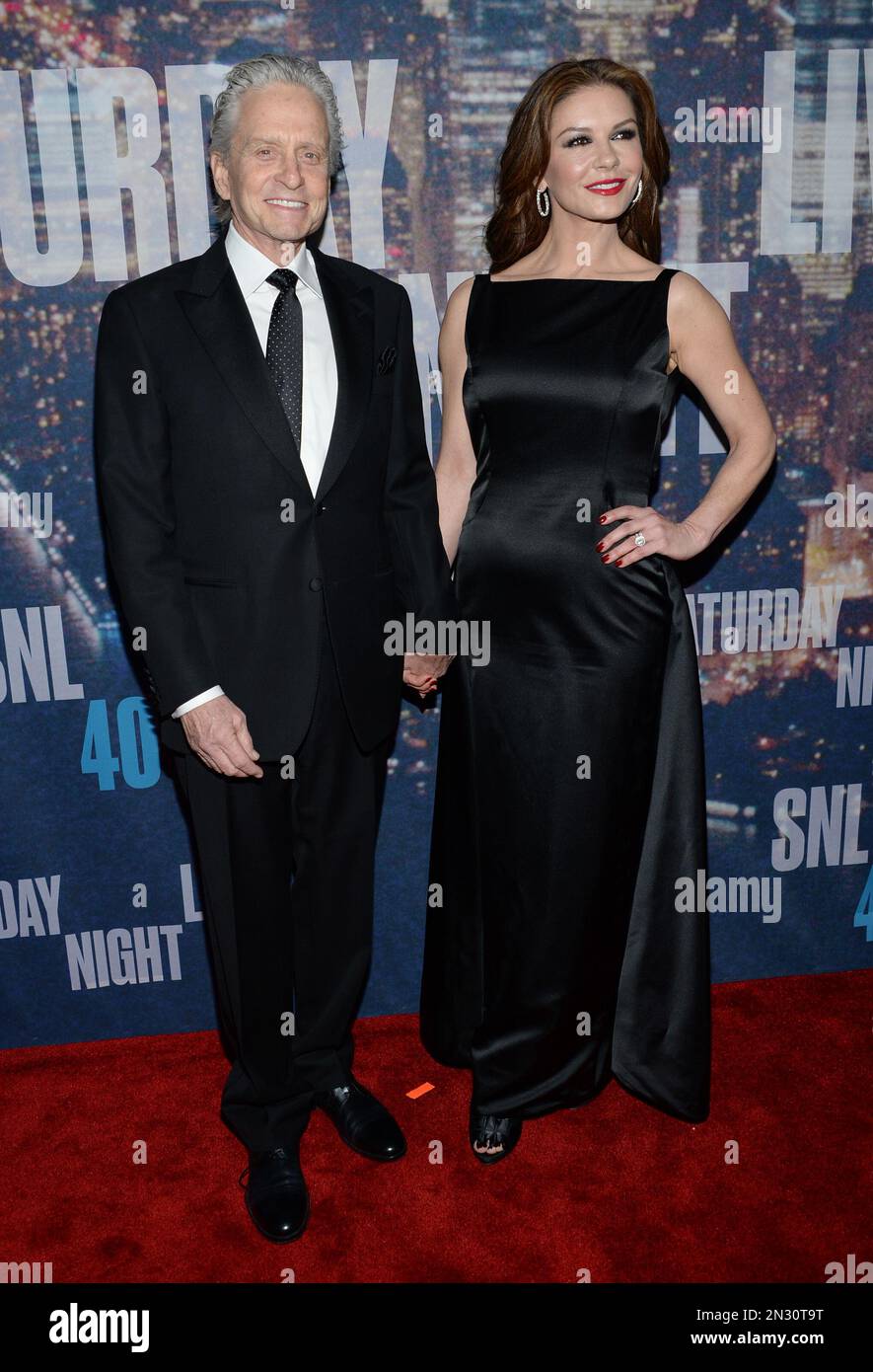 Michael Douglas, left, and Catherine Zeta-Jones arrive at the Saturday ...