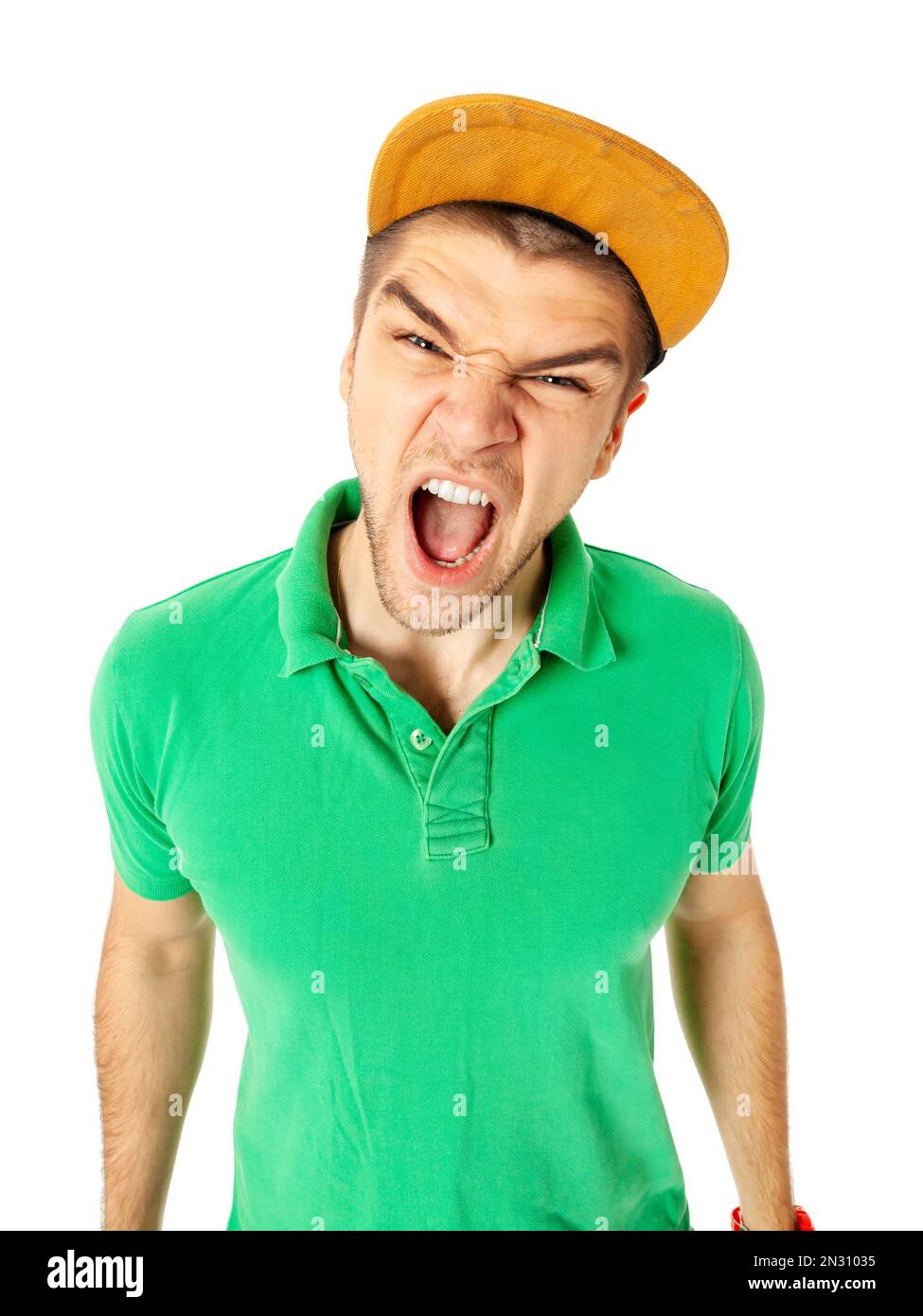 Studio portrait of screaming young guy in studio. Wide angle lens effect Stock Photo - Alamy