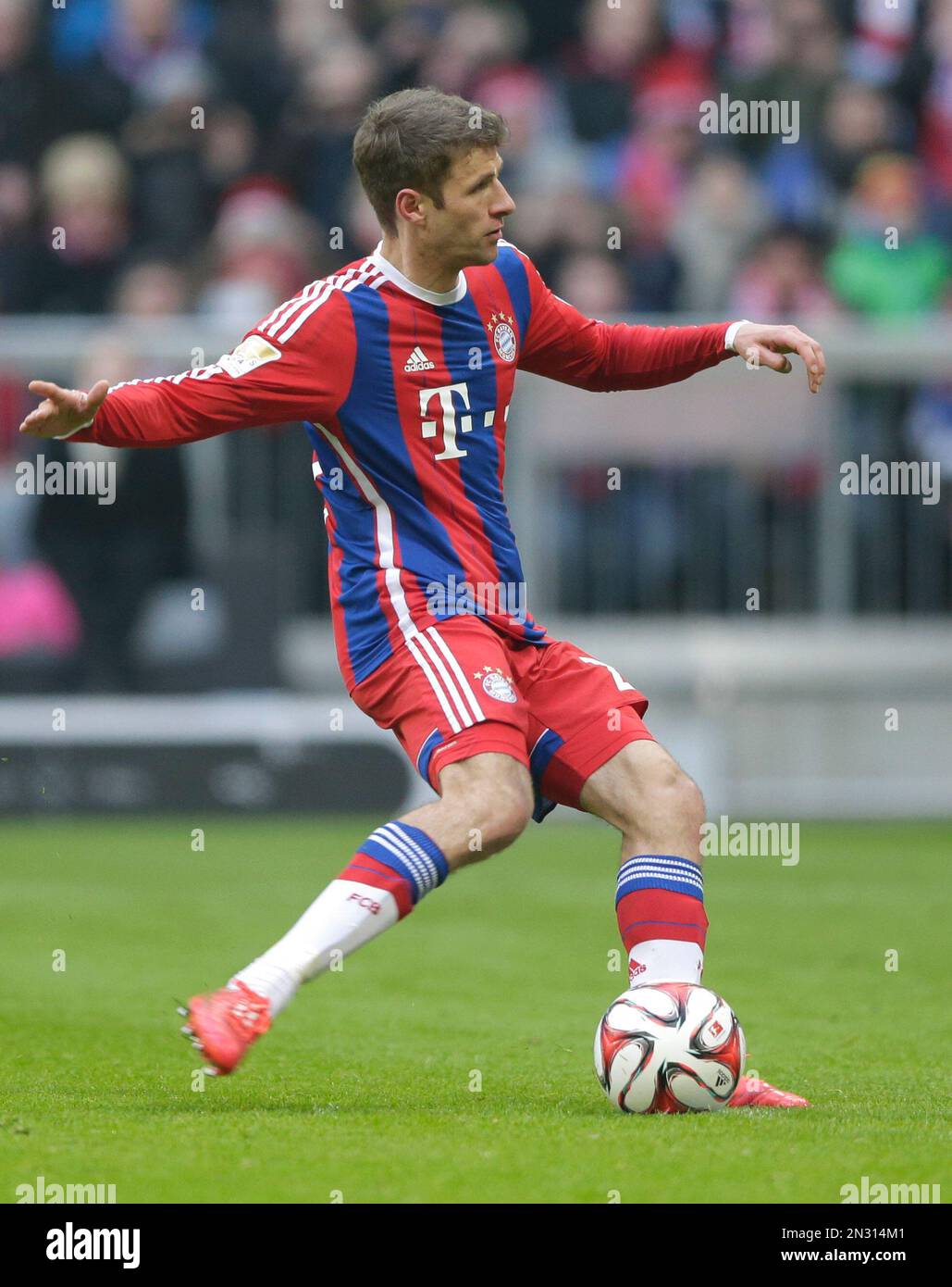 Bayern's Thomas Mueller kicks a penalty and scores his side's opening ...