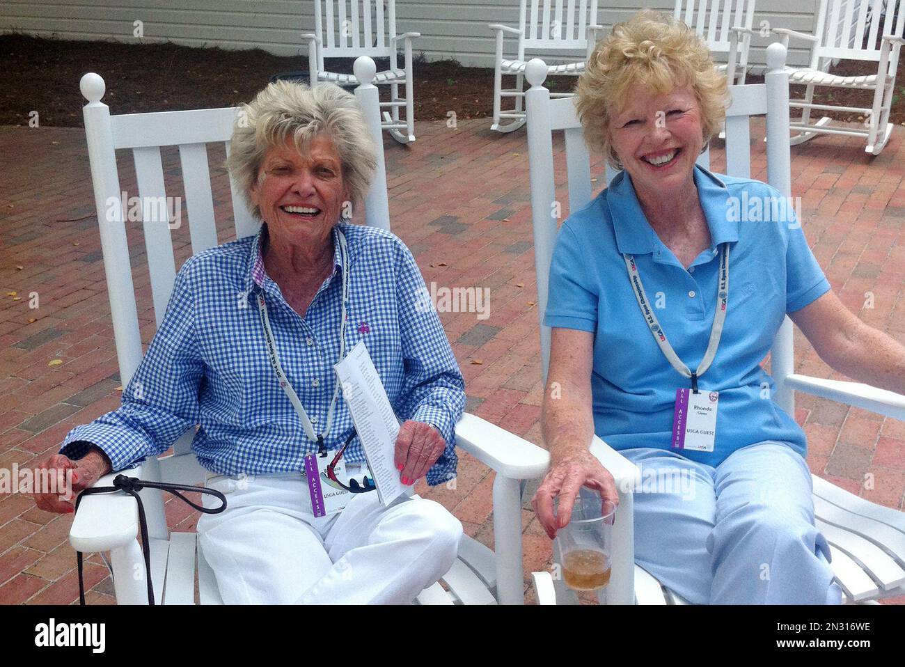 In this photo taken June 17, 2014, Rhonda Glenn, right, sits on the ...