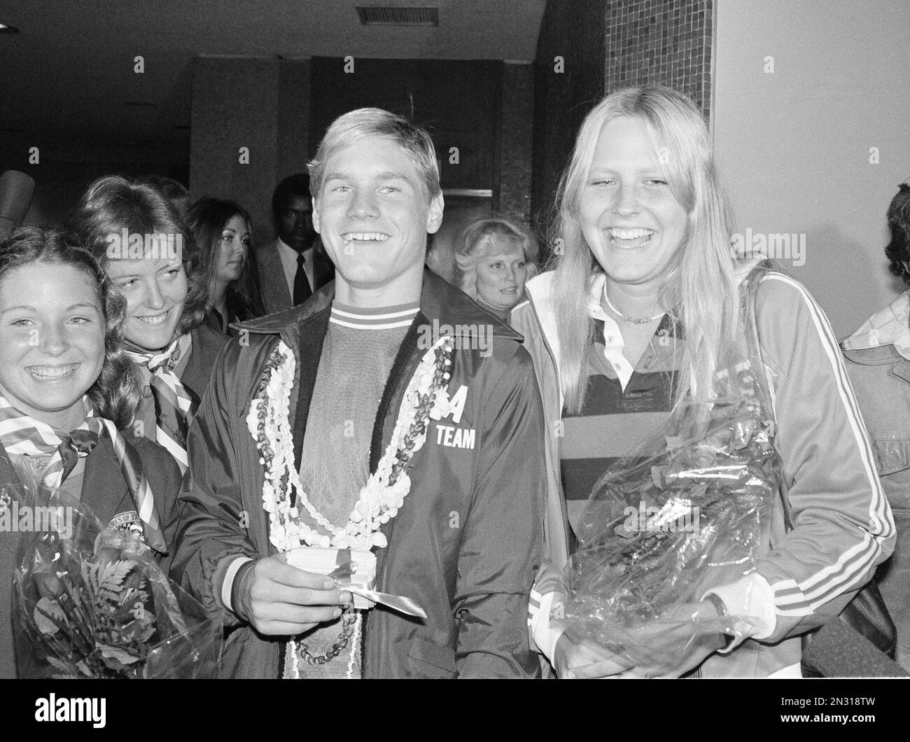 Shirley Babashoff, right, and Brian Goodell, two stars of the Olympic swimming team, are met by ...