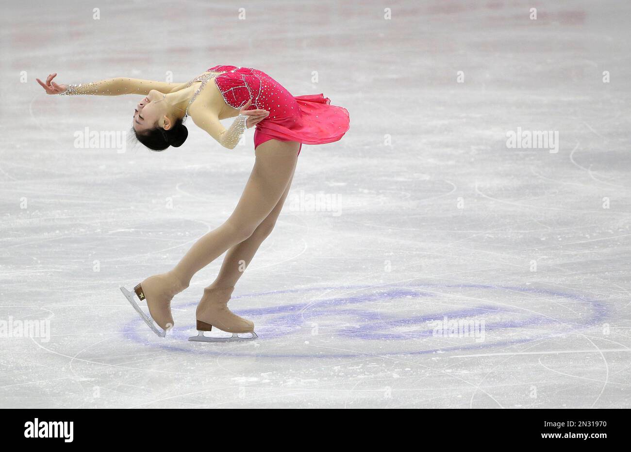 Li Zijun of China performs during the women's short program in the ISU ...