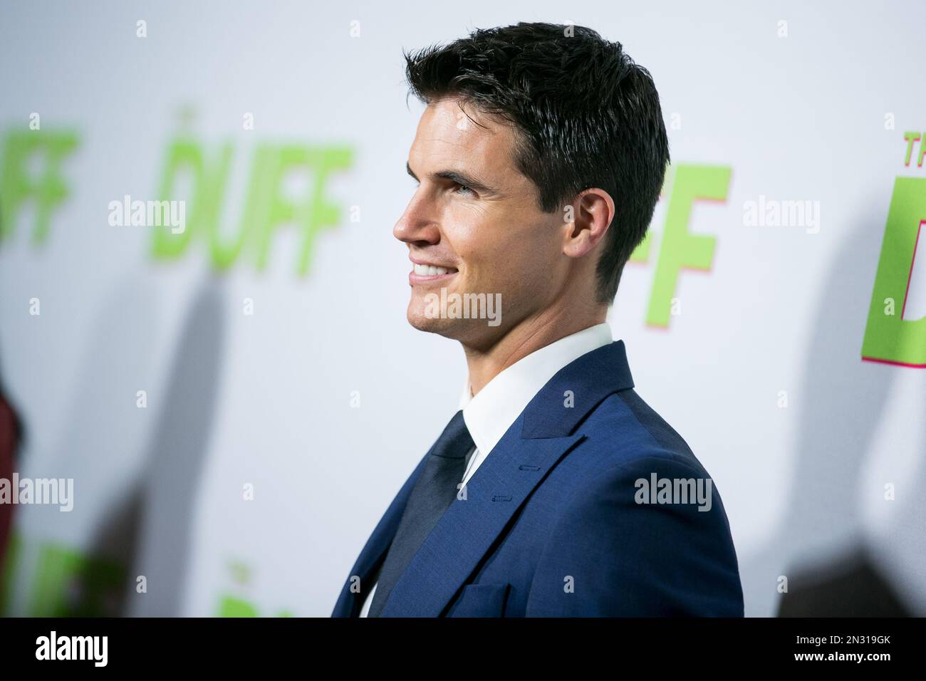 Robbie Amell arrives at the Los Angeles Fan Screening of "THE DUFF" on ...