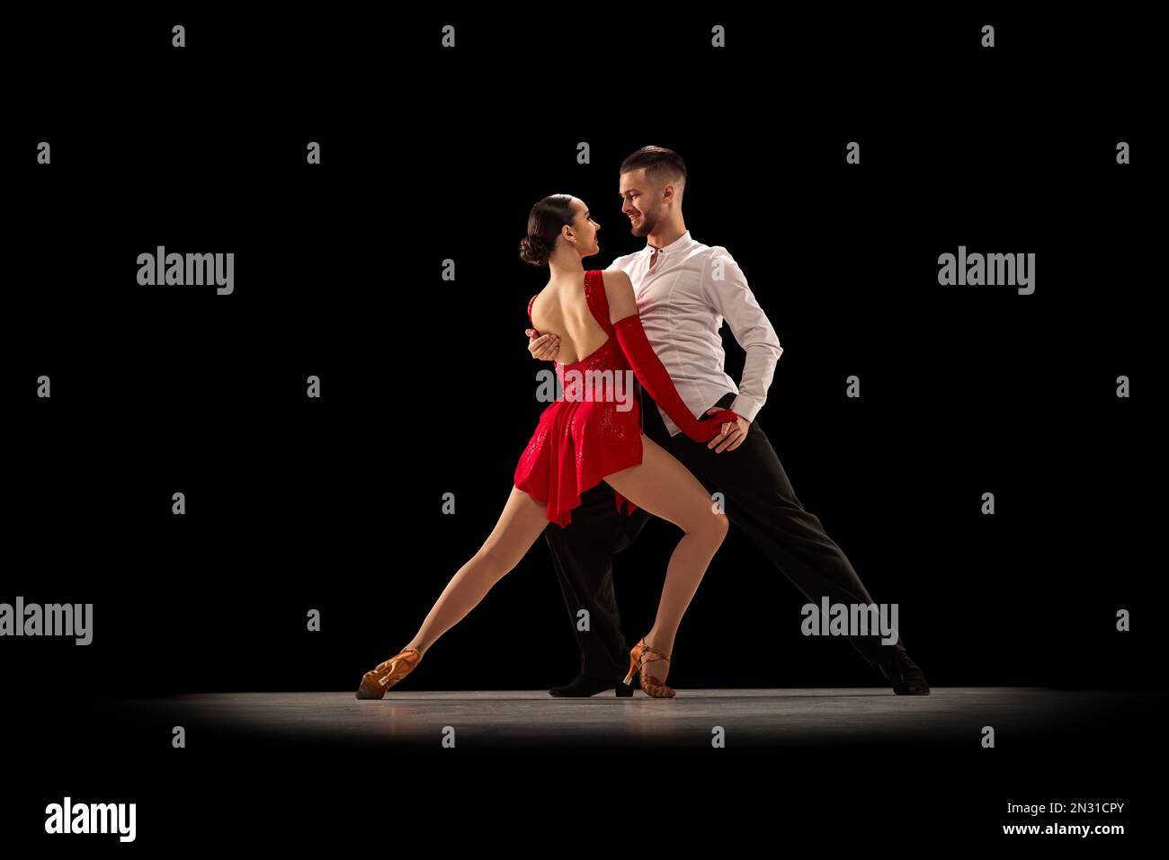 Beautiful girl and handsome man, professional classical dancers ...