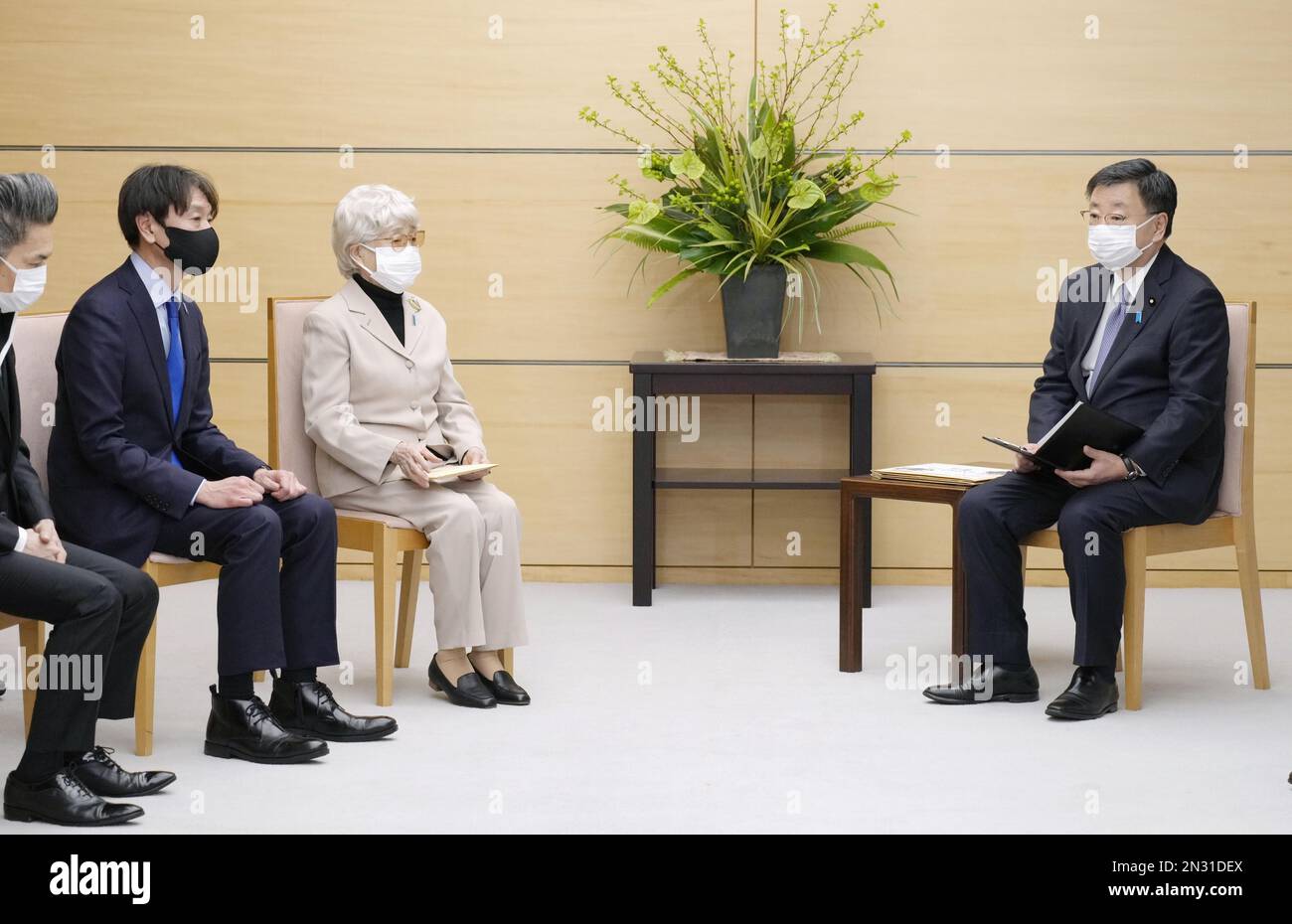 Japanese Chief Cabinet Secretary Hirokazu Matsuno (R) holds talks at ...