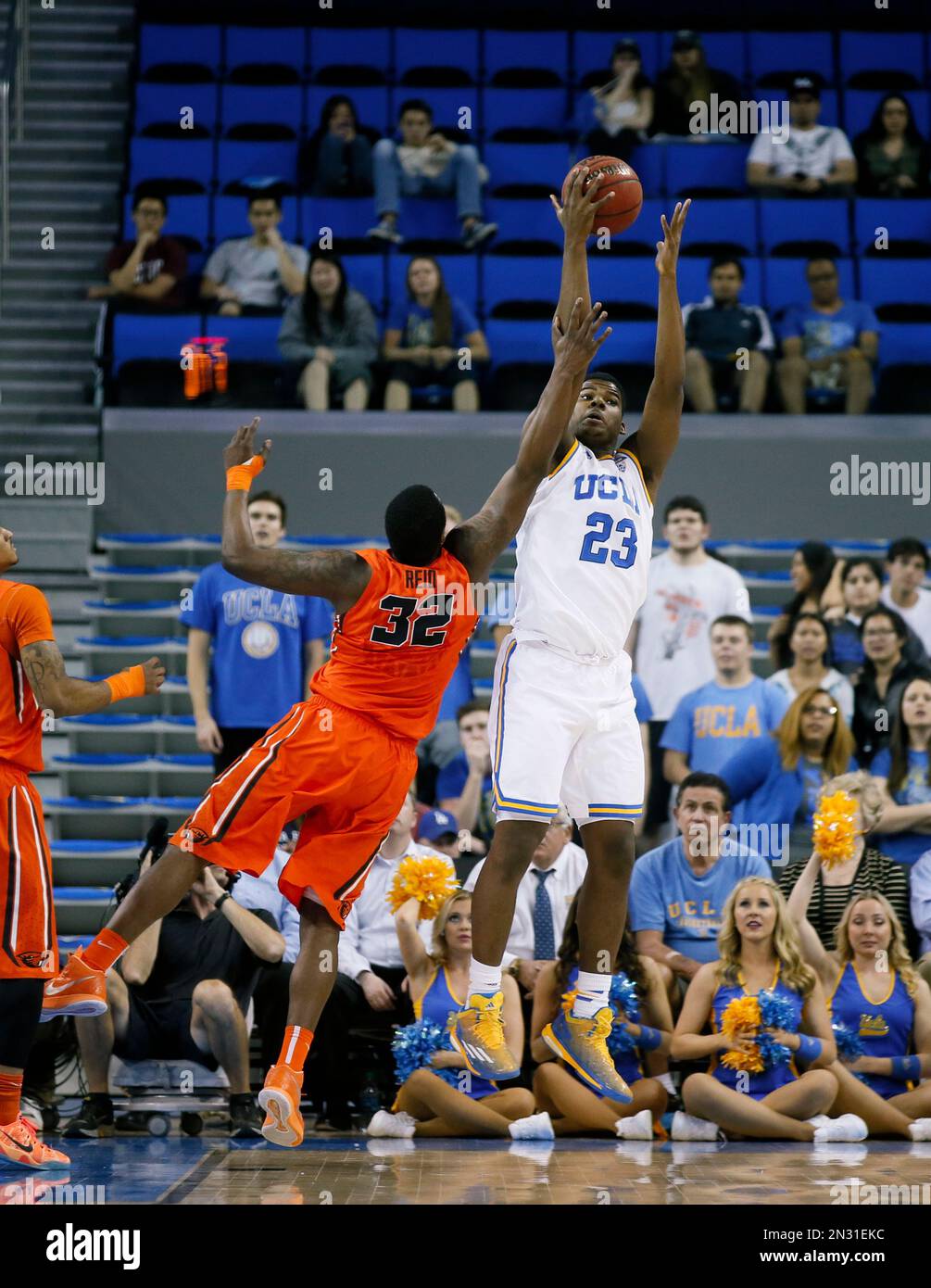 Oregon State's Jarmal Reid, left, and UCLA's Tony Parker reach for a ...