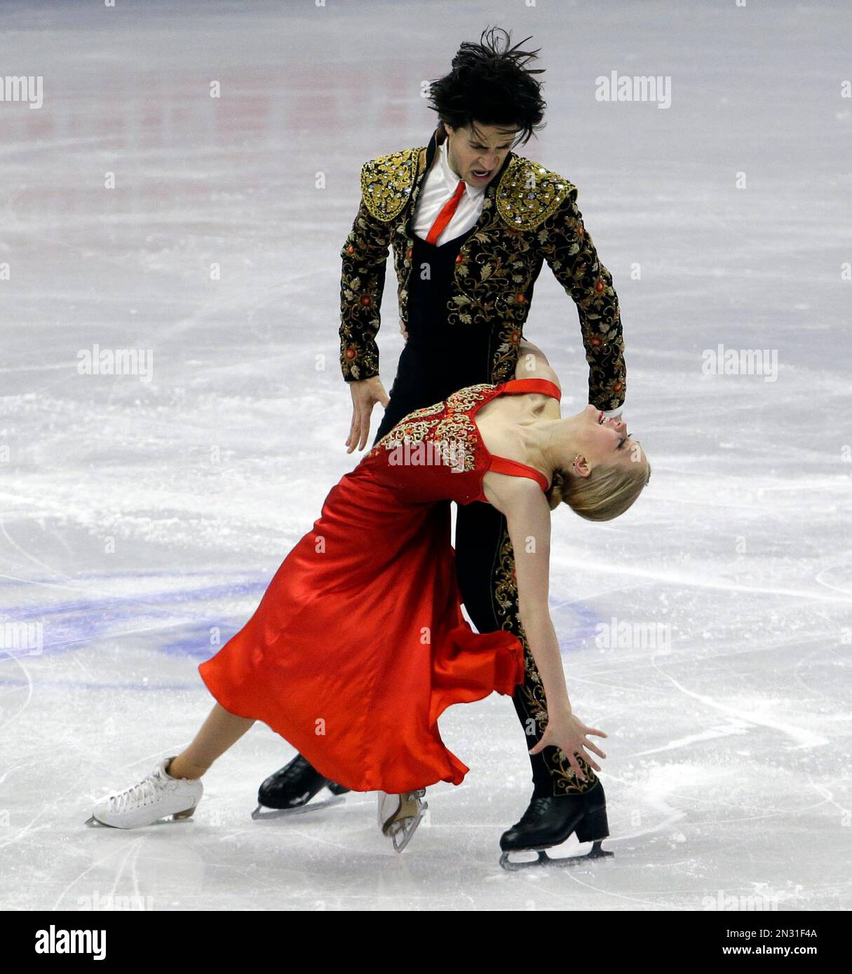 Kaitlyn Weaver and Andrew Poje of Canada perform during the ice dance ...