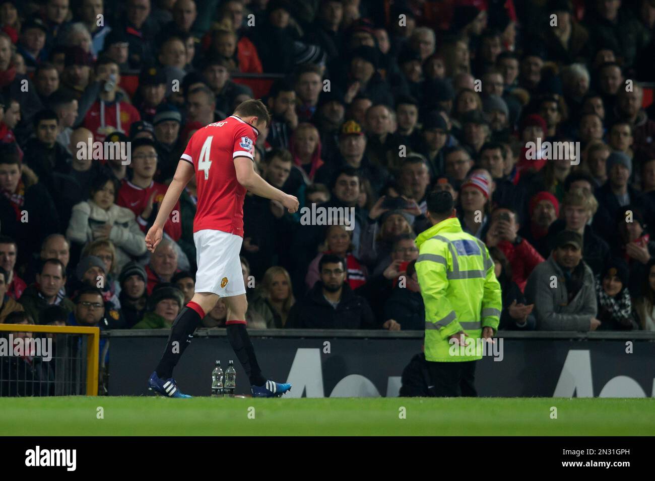 Manchester United's Phil Jones walks injured from the pitch during the ...
