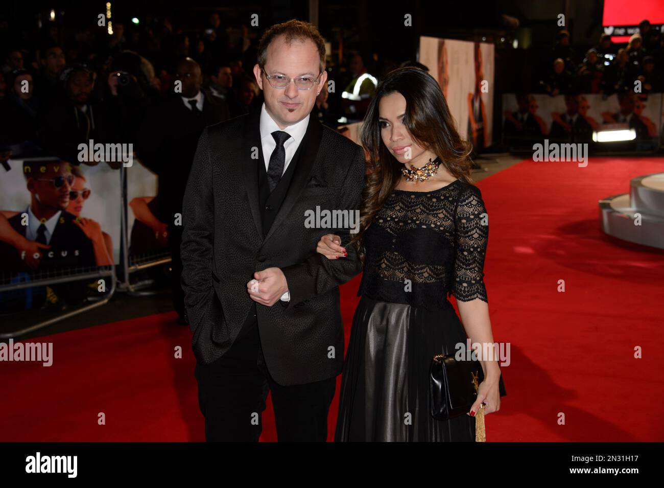 Apollo Robbins poses for photographers at the screening of Focus, at a ...