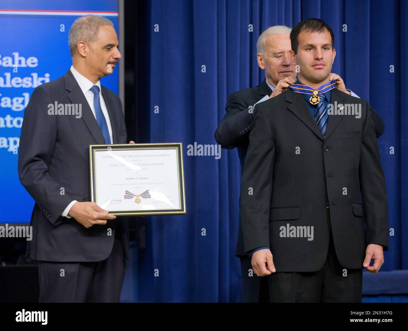 Vice President Joe Biden and Attorney General Eric Holder award the ...