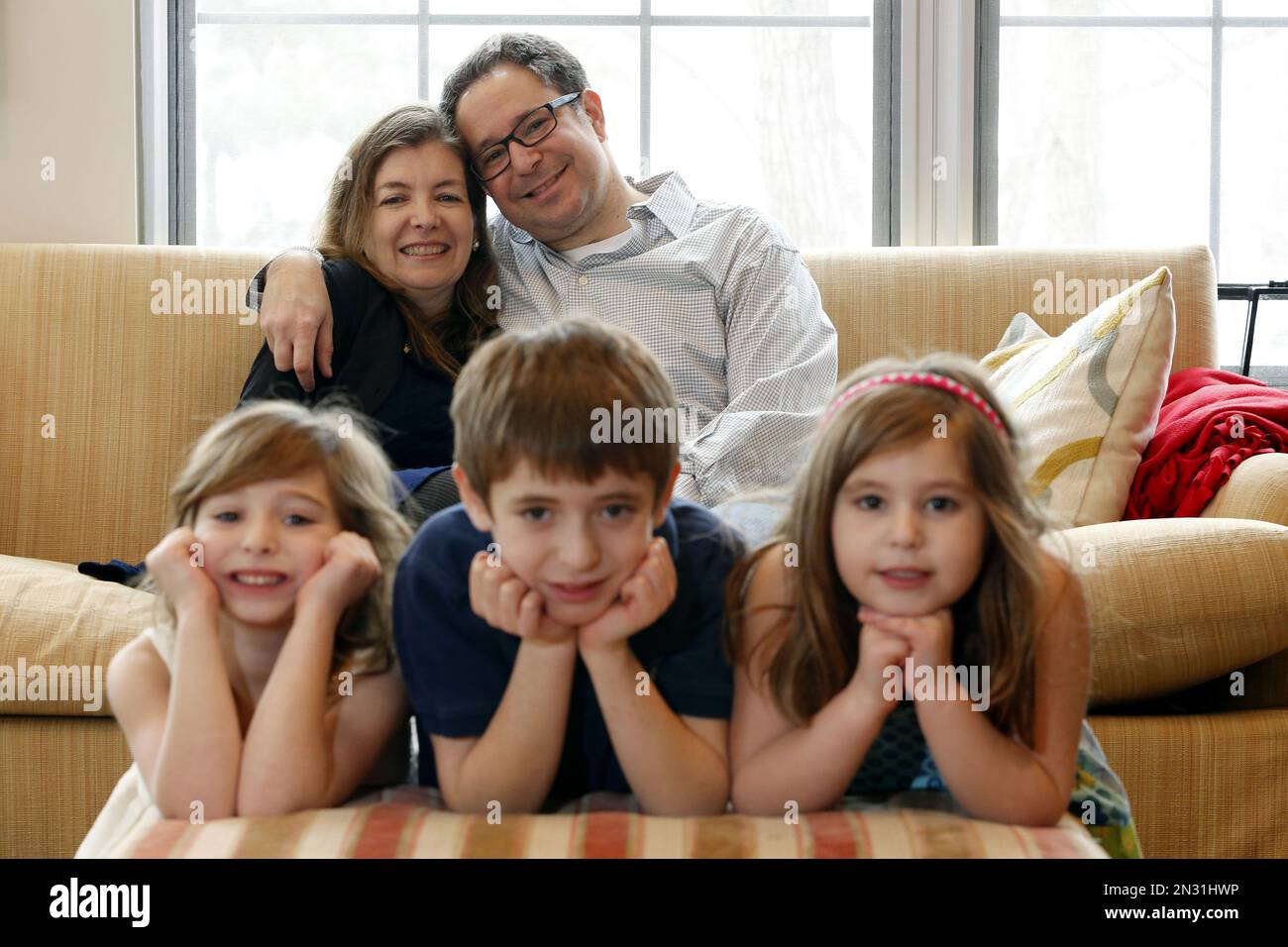 In this Saturday, Feb. 7, 2015 photo, Charlie Breslin, background right ...