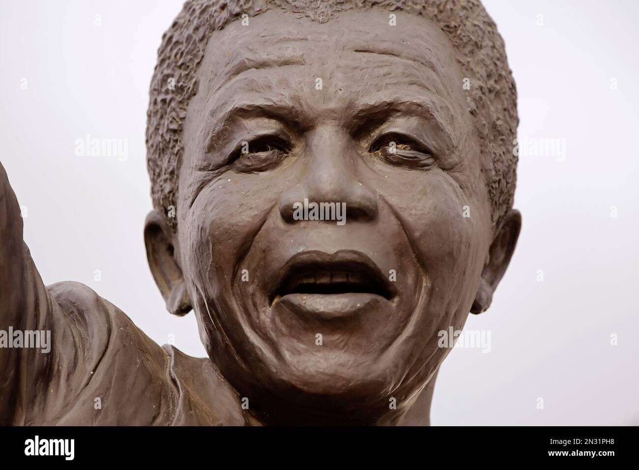 A statue of former South African President Nelson Mandela, with a ...