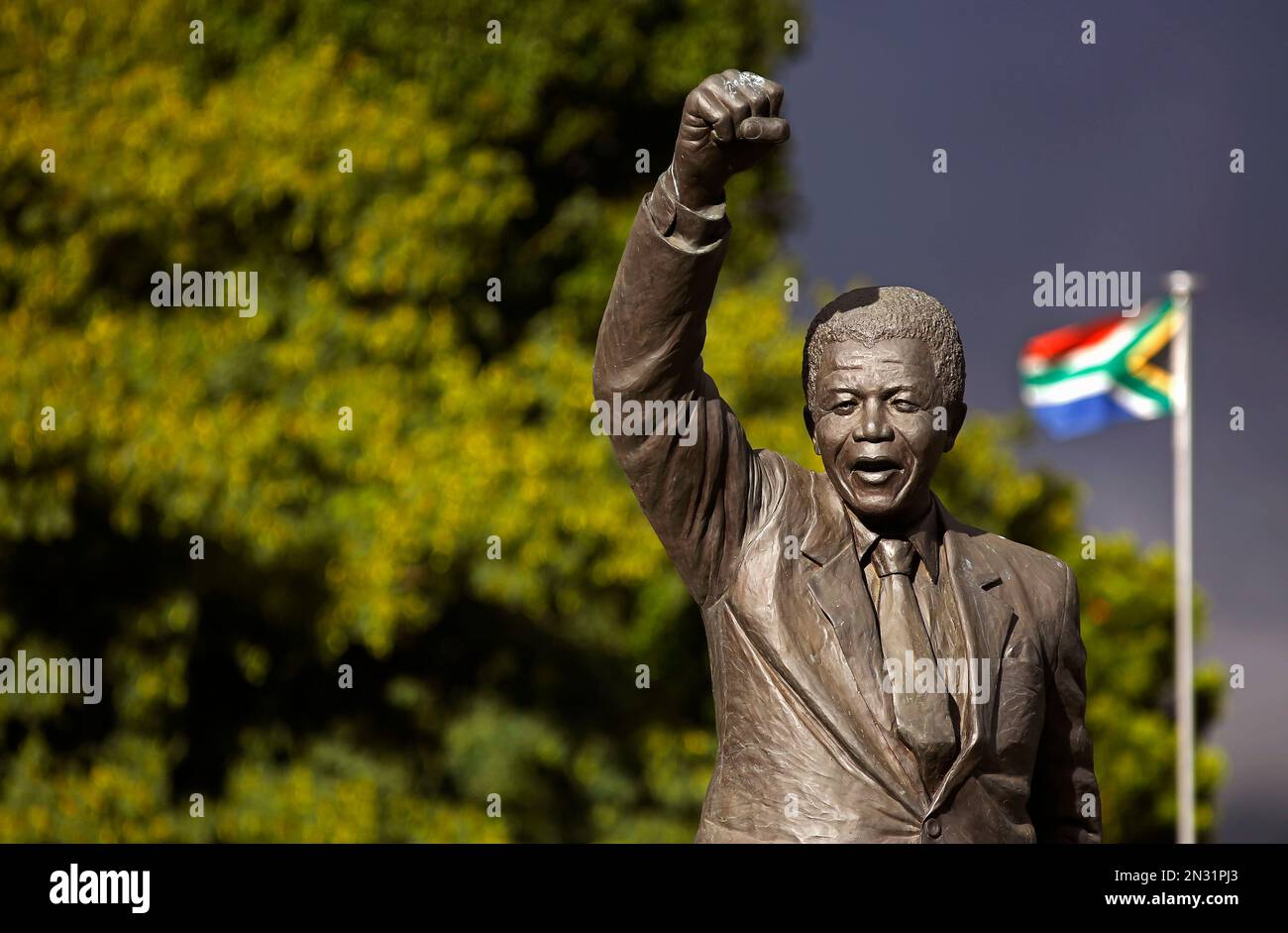 A statue of former South African President Nelson Mandela, with a ...