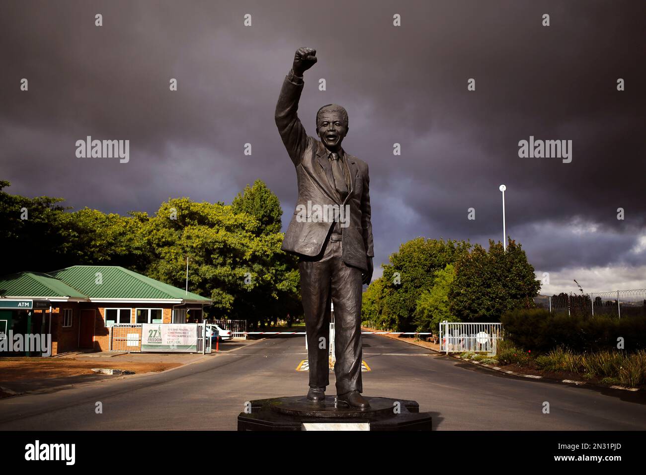 A statue of former South African President Nelson Mandela, with a ...
