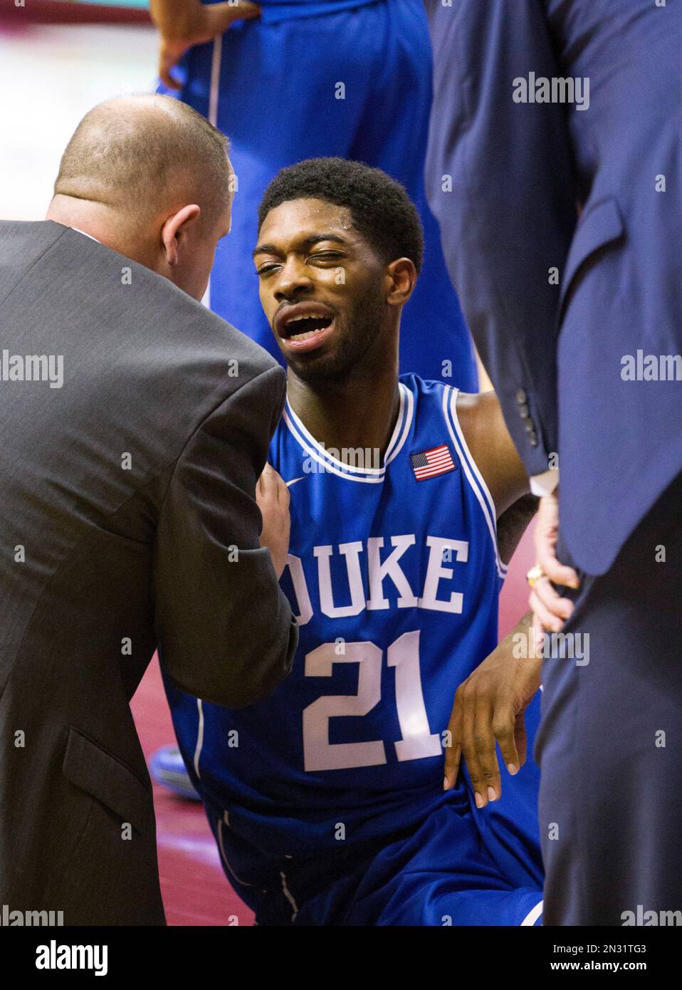 Duke head coach Mike Krzyewski, right, and an assistant coach check on ...