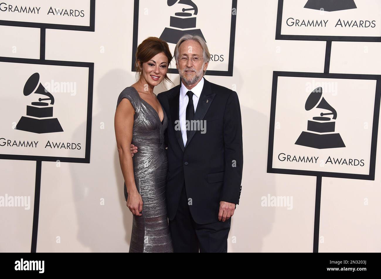 Michele Tebbe, left and Neil Portnow arrive at the 57th annual Grammy ...