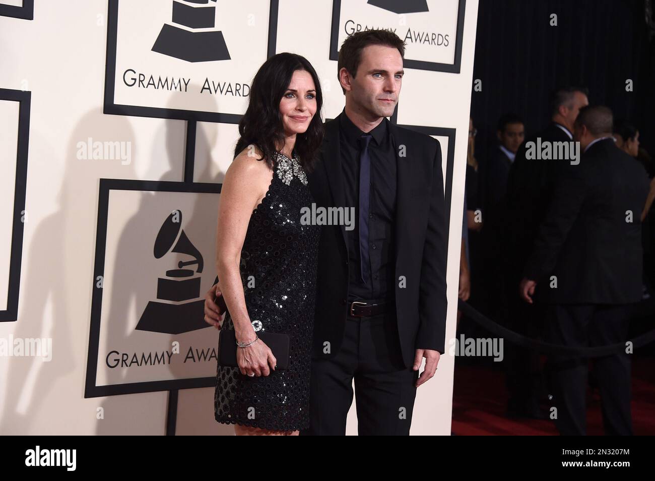Courteney Cox, left, and Johnny McDaid arrive at the 57th annual Grammy ...