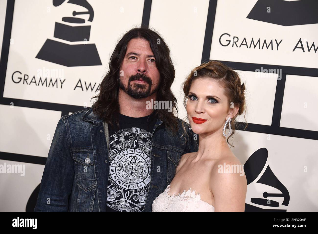 Dave Grohl, left, and Jordyn Blum arrive at the 57th annual Grammy ...
