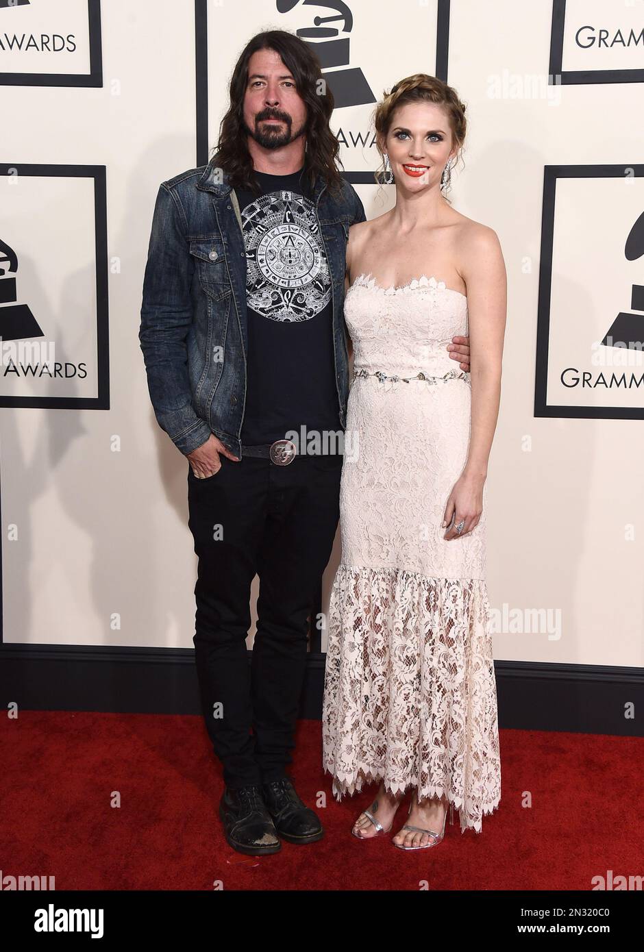 Dave Grohl, left, and Jordyn Blum arrive at the 57th annual Grammy ...