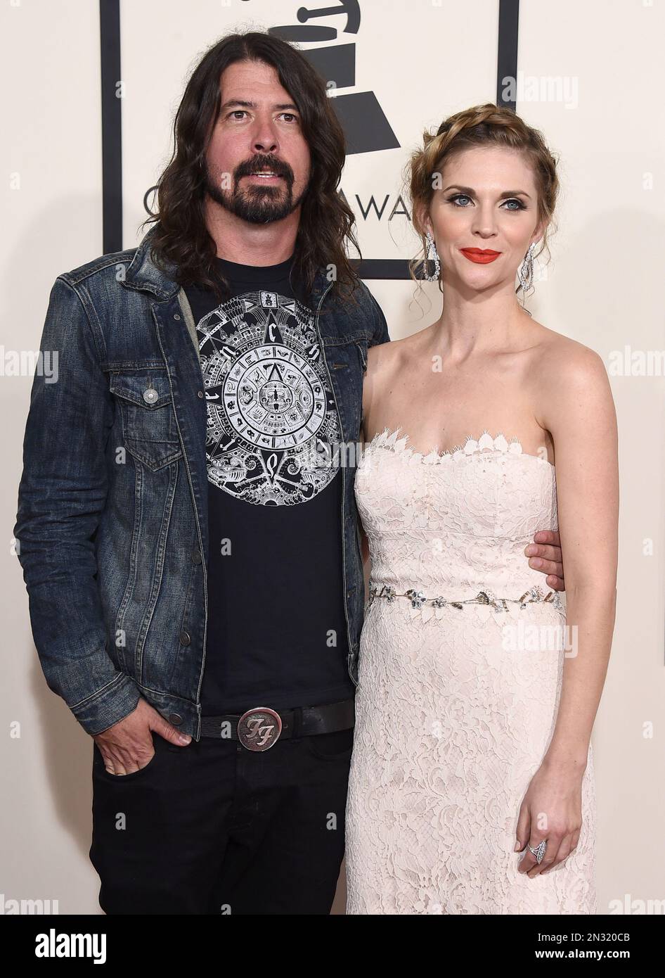 Dave Grohl, left, and Jordyn Blum arrive at the 57th annual Grammy ...