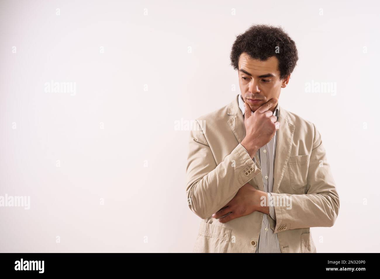 Image of worried businessman thinking Stock Photo - Alamy
