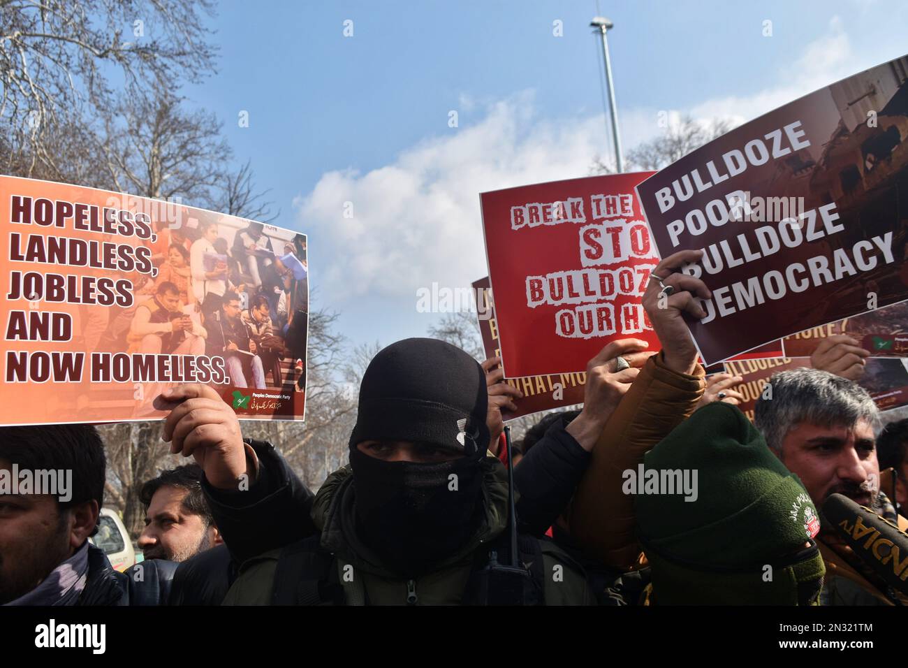 Srinagar, India. 07th Feb, 2023. A police officer stopped the members ...