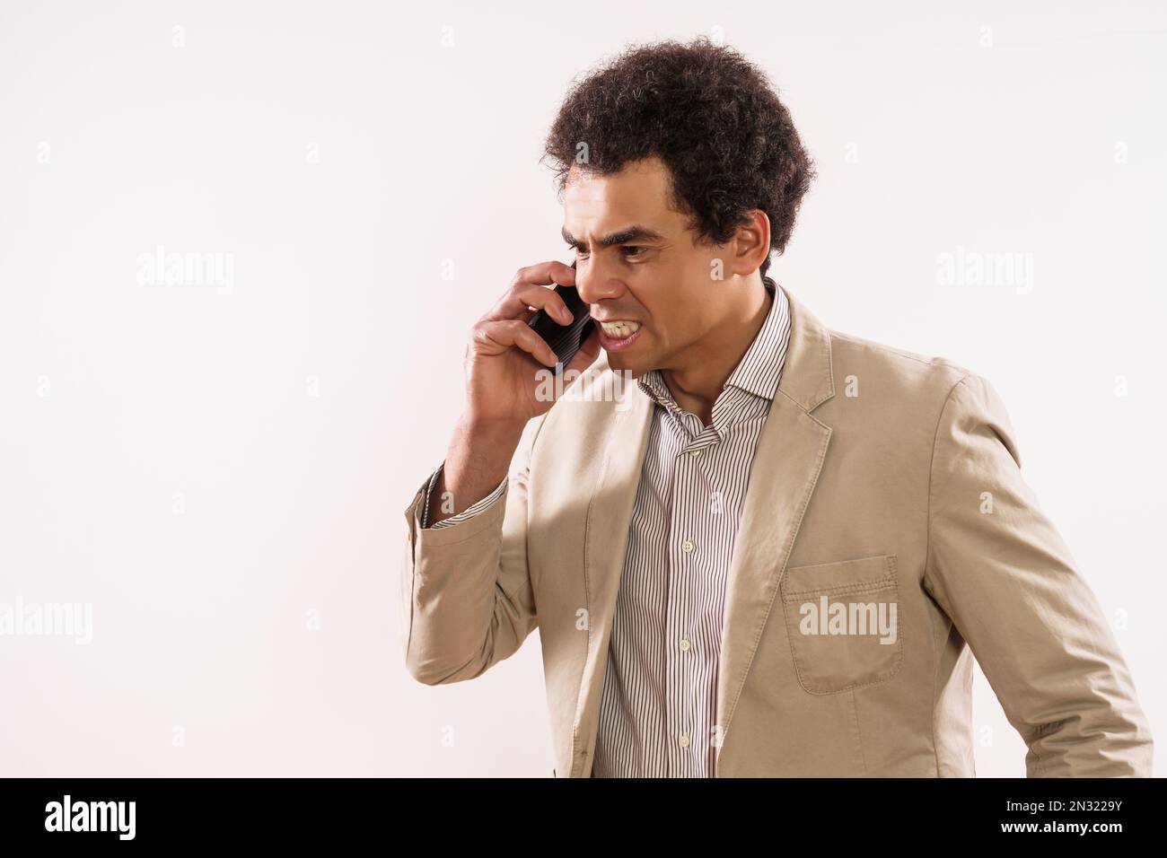 Angry furious businessman working on hi-res stock photography and ...